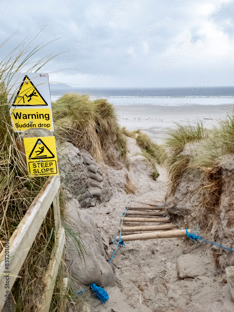 Signs warning of Sudden Drop and Steep Slope at Dooey beach by ...