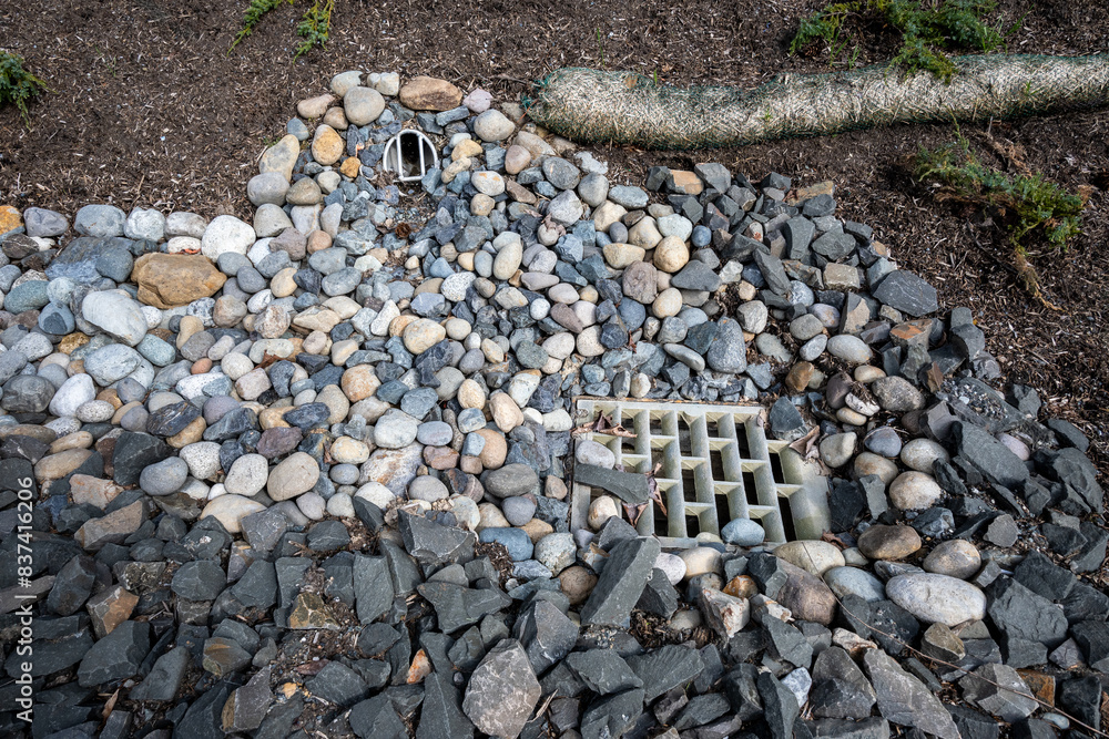 New installation of storm water flood management, round outflow pipe ...