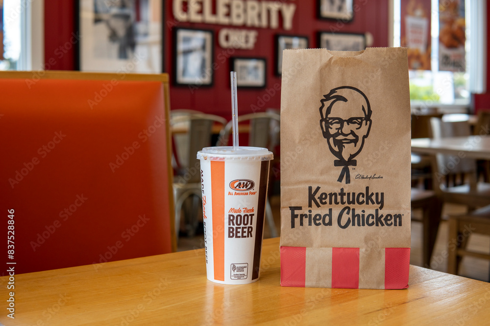 Everett, WA, USA - 25 May 2024. Kentucky Fried Chicken paper bag and to ...