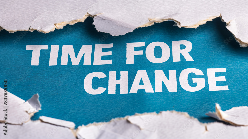 Ripped paper revealing “Time for Change” message on a vibrant blue ...