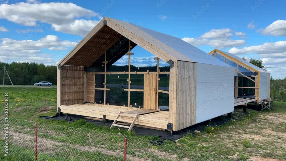 Barn House construction. Barnhouse in countryside. Modern Wooden house ...