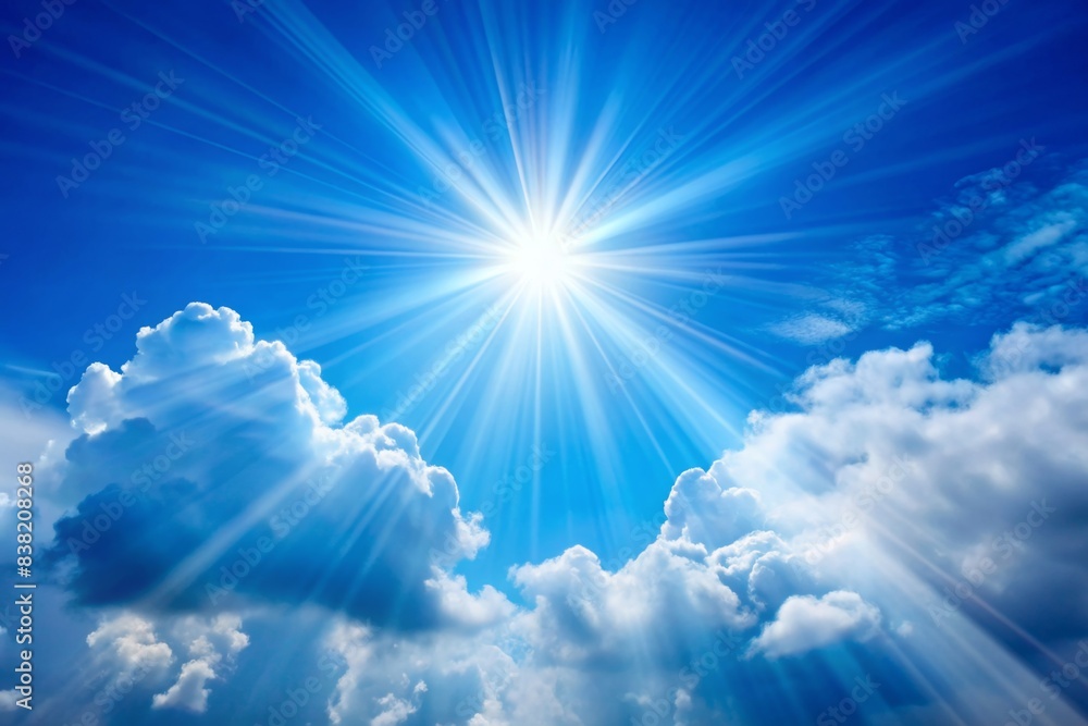 Sunbeam shining through haze in blue sky with vertical orientation ...