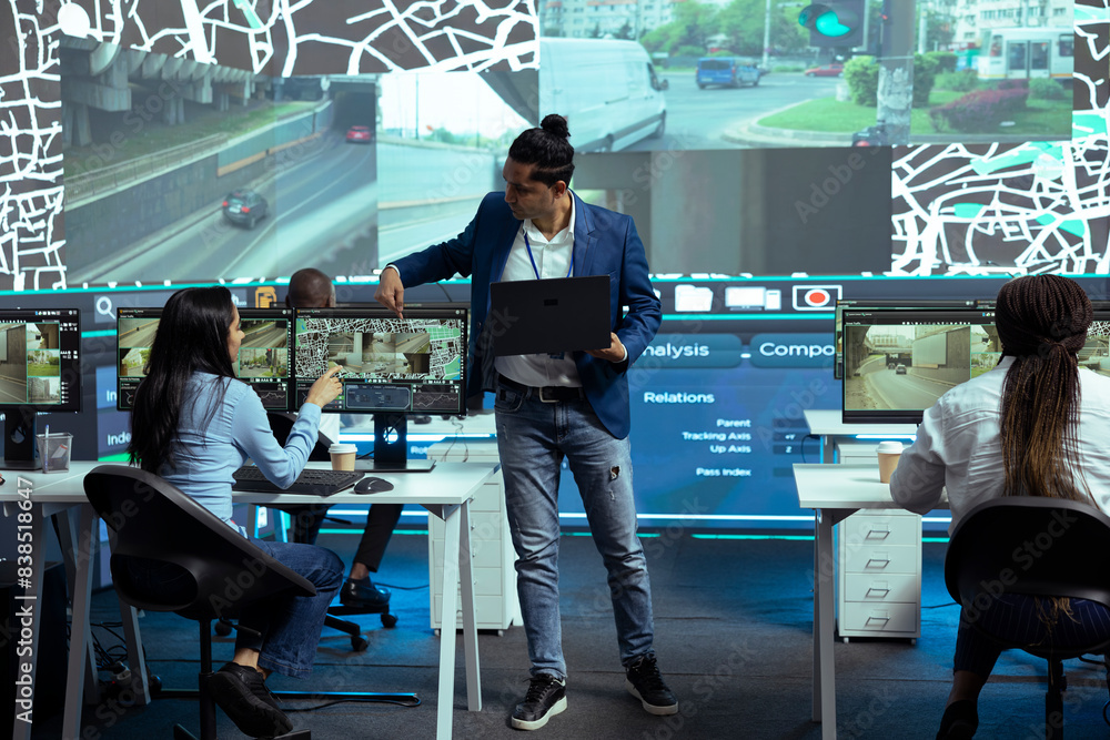 Indian coordinator offers instructions for his staff in control center ...