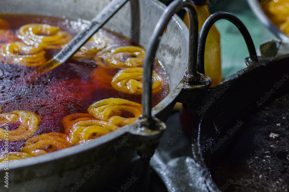 Jalebi or jilipi, freshly cooked for hindu festival of ratha Yatra. It ...