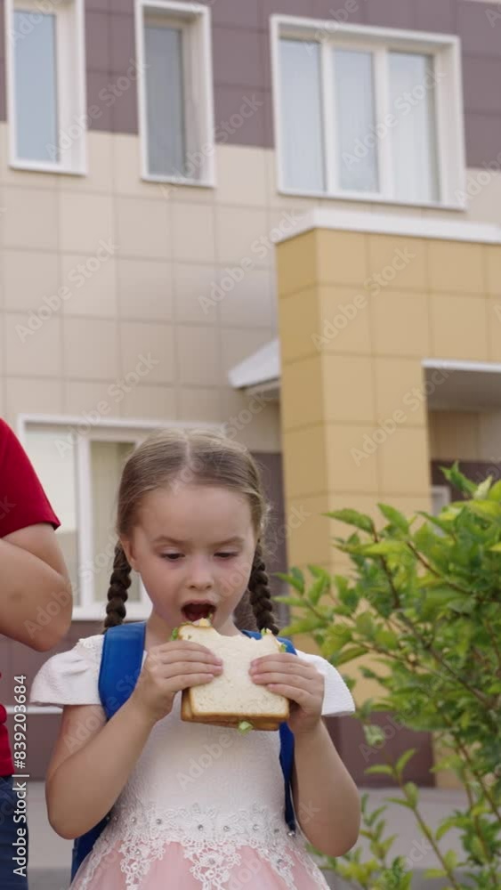 happy children boy girl with school backpacks eating sandwich, happy ...