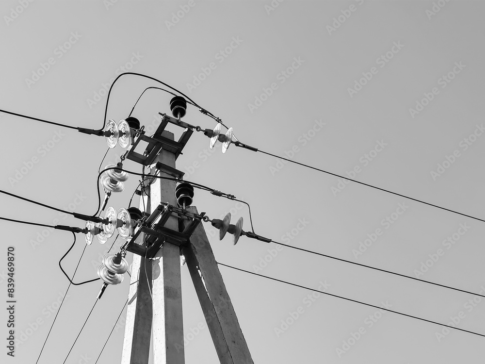 Concrete pillars with electrical wires, cables, connecting wires and ...