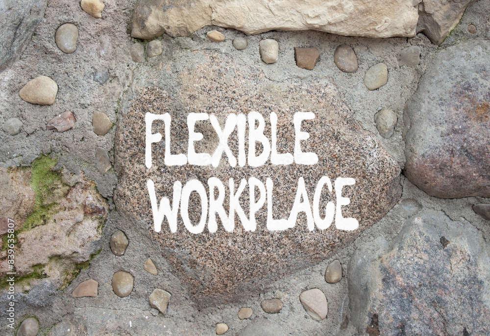 Flexible workplace symbol. Stone wall with words Flexible workplace ...