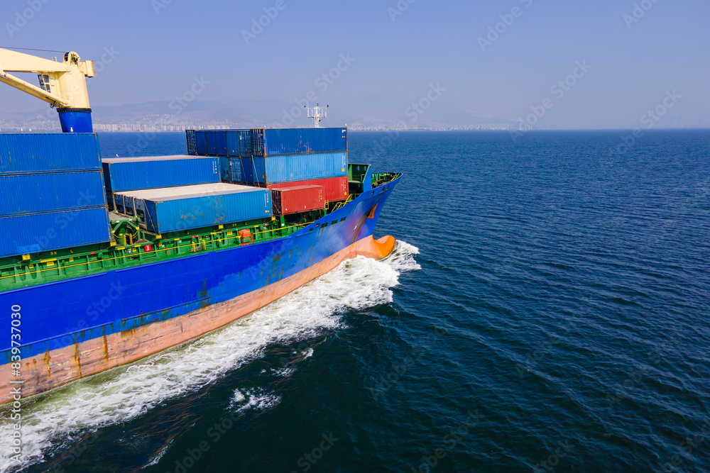 Cargo container ship cruising in sea to cargo port for logistics import ...