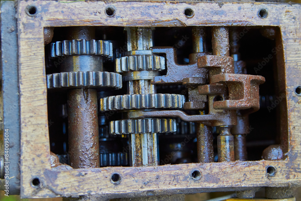 rusty gears in the gearbox of the tractor, transmission of the gearbox ...