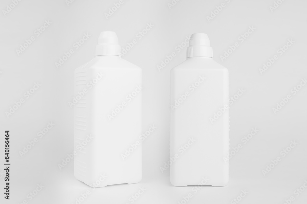 White plastic bottles mockup. Set of two bottles front and side view on ...