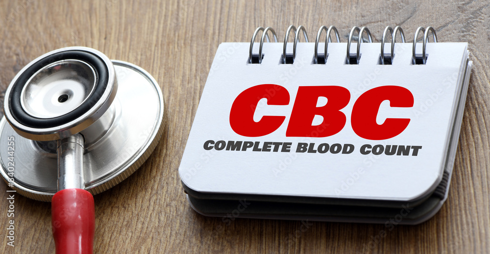 CBC - complete blood count words in an office notebook next to a ...