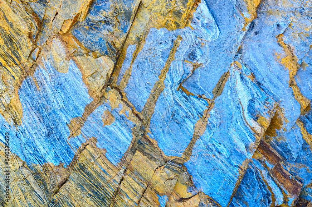 Vivid blue and gold textured rock surface Stock Photo | Adobe Stock