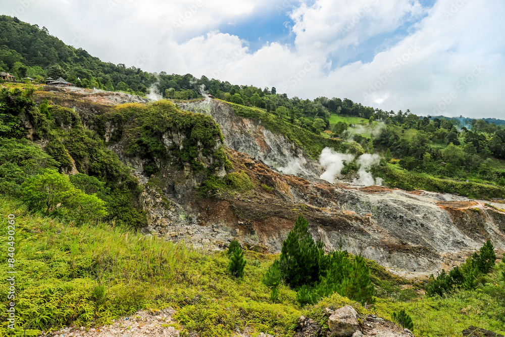 Steaming fumarole field at Bukit Kasih, a tourist volcanic park with a ...