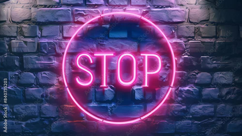 neon stop sign in bright pink light against a dark brick wall ...