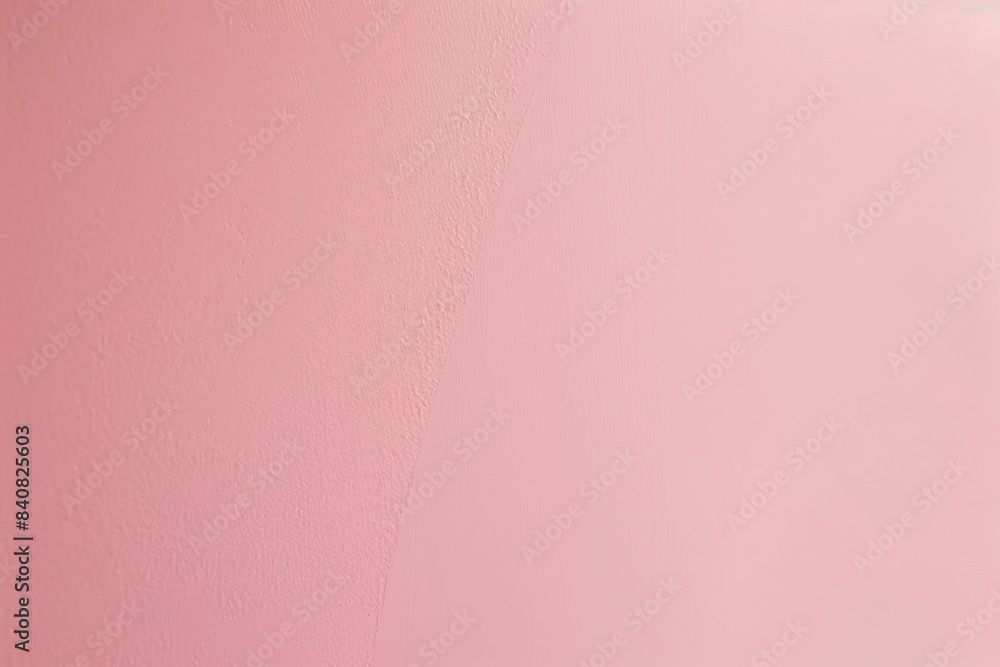 Solid pink wall is shown, offering a simple yet vibrant backdrop ...