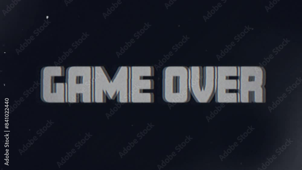Game Over text message scrolling on an old style film frame with dust ...