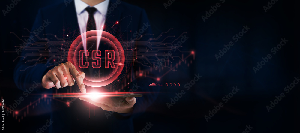 CSR Businessman Uses Tablet and Digital Networking Interface on ...