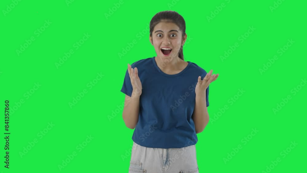 Happy Indian teenage girl getting a big surprise Green screen Stock ...