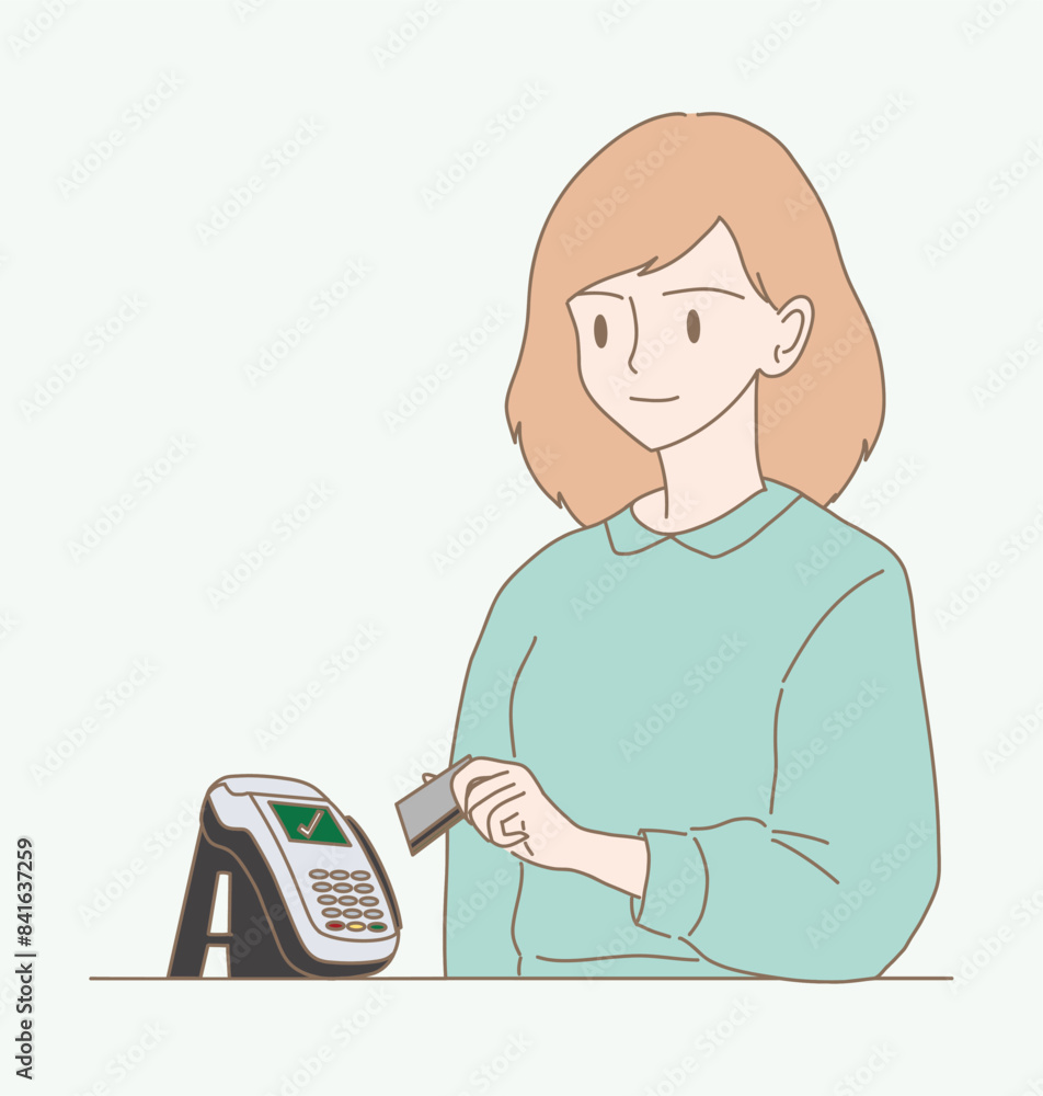 Woman holding, waving credit card, debit card close to the POS terminal ...