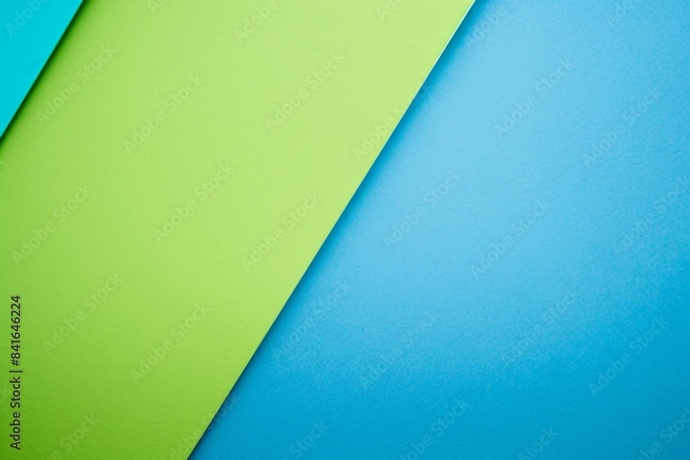 Vibrant green and blue paper sheets in a diagonal line, perfect for ...
