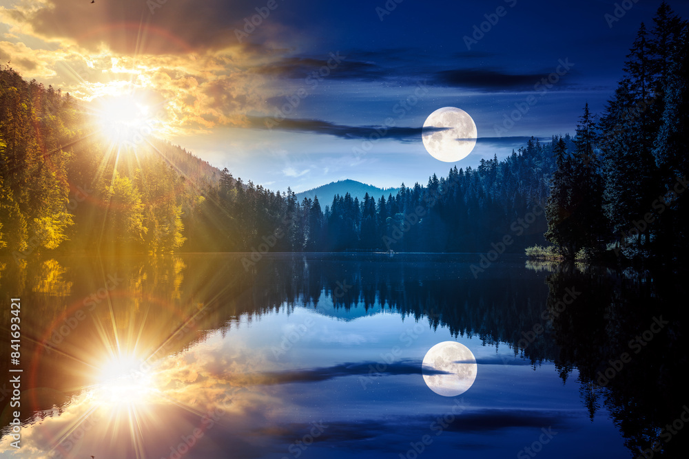fantasy scenery with mountain lake among forest at summer solstice ...