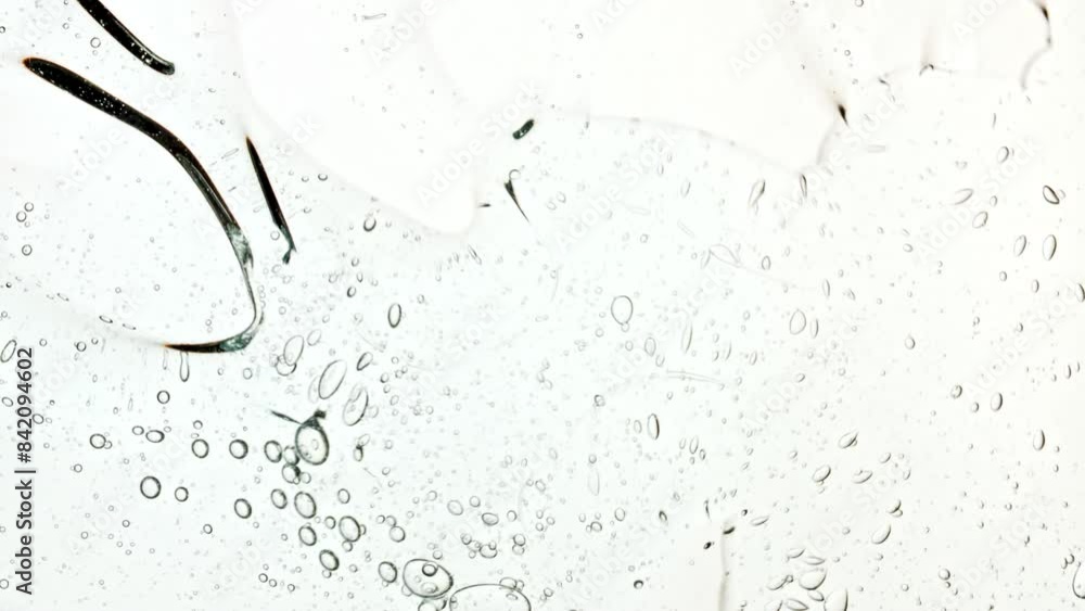 Bubble cluster, cells under a microscope. Transparent cosmetic gel ...