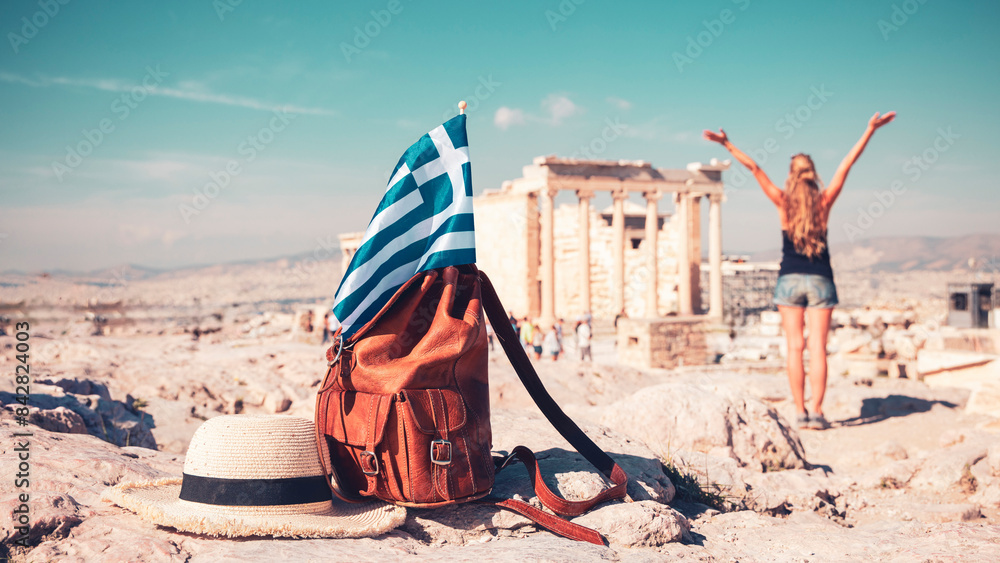 Travel destination in Greece- Bag, summer hat and greek flag at Athens ...
