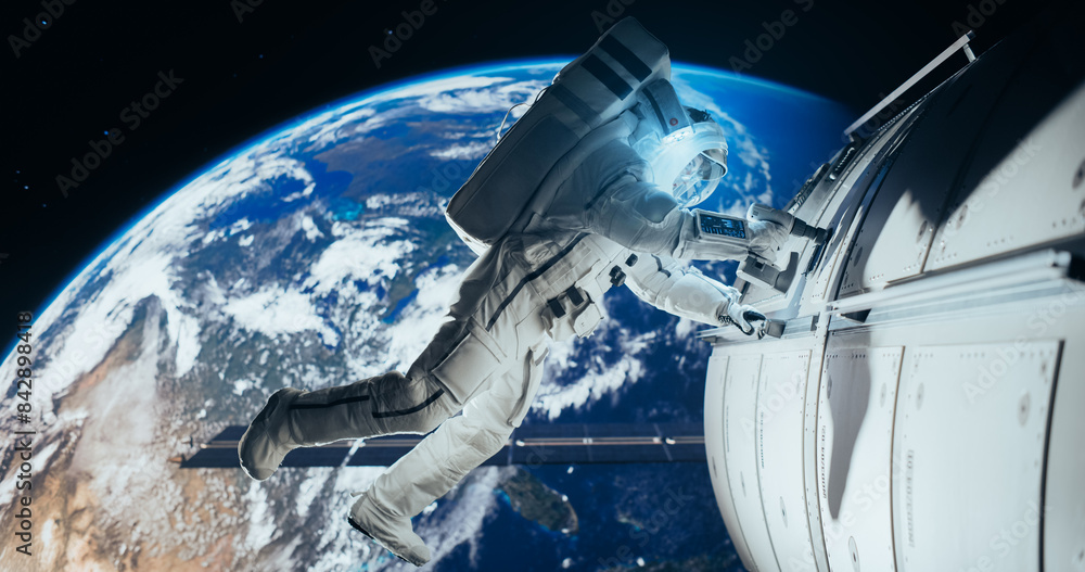 Astronaut on an Extravehicular Mission in Outer Space Far From Planet ...