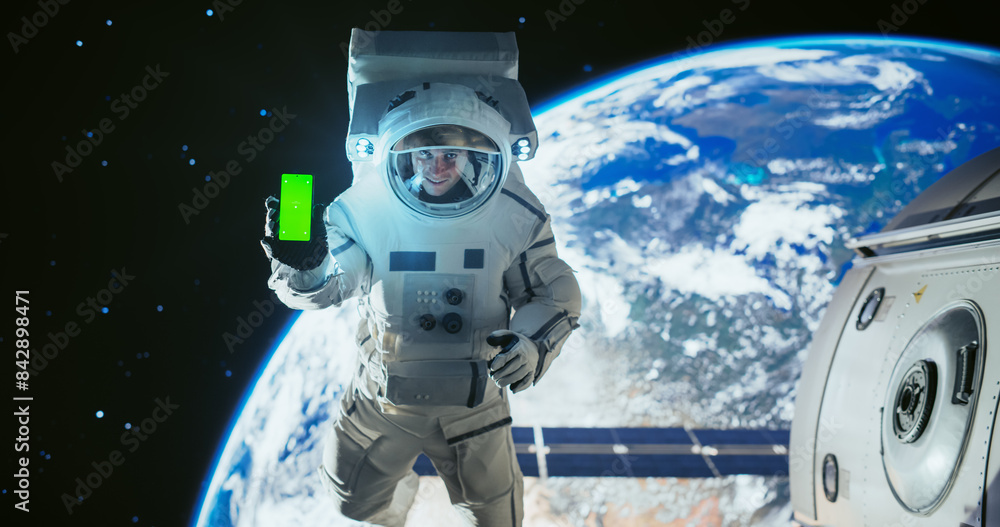 Young Astronaut Floating in Space in Zero Gravity. Spaceman Showing a ...