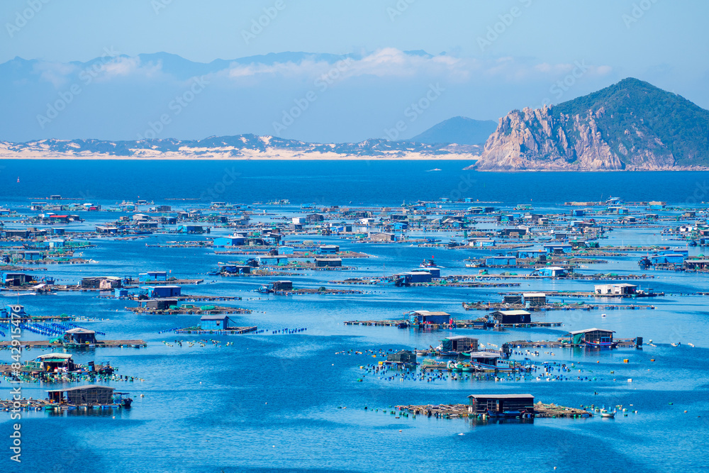 Aerial view of the lobster feeding farms, float fishing village in Vung ...