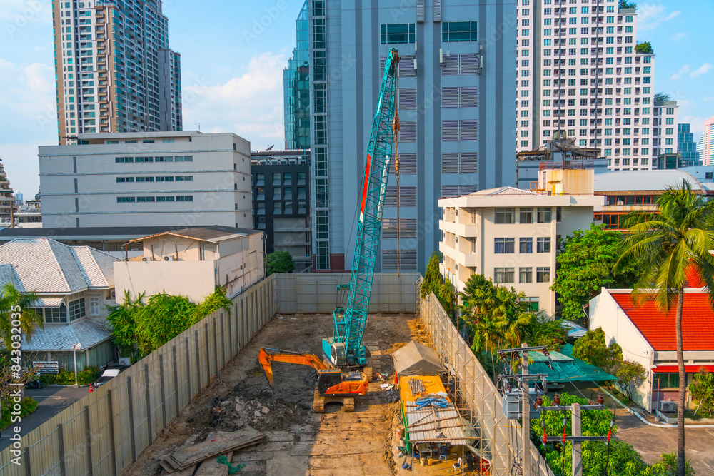 Small plot of land in a cramped apartment among high-rise buildings ...