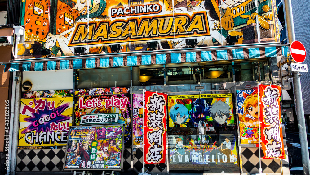 Tokyo, Japan – April 2024: the colorful facade of a pachinko parlour in ...