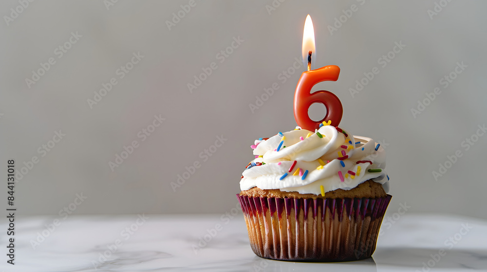 Birthday cupcake with burning candle in the shape of number 6. white ...