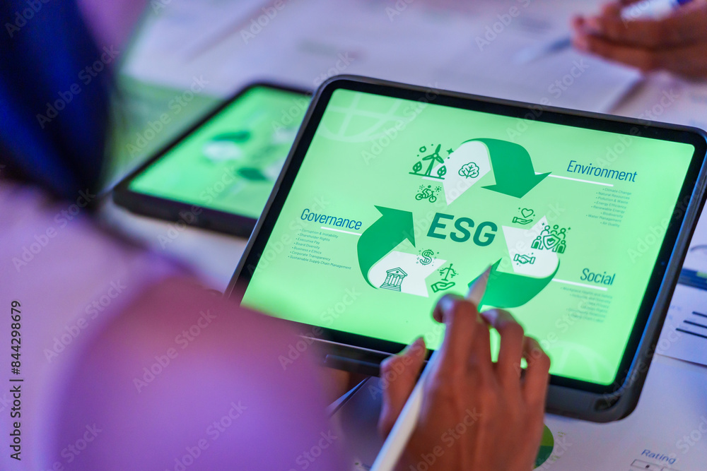 ESG ( environment, social,governance) recycle sign on laptop screen ...