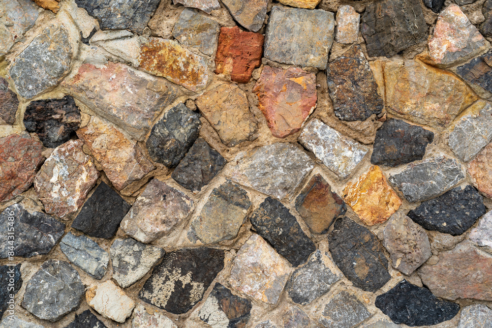 hard stones stack or modern rock wall dam and brown gray granite floor ...