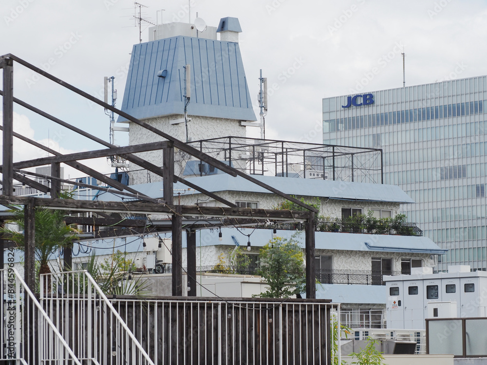 TOKYO, JAPAN - June 4, 2024: Top of a buildings in Tokyo's Aoyama area ...