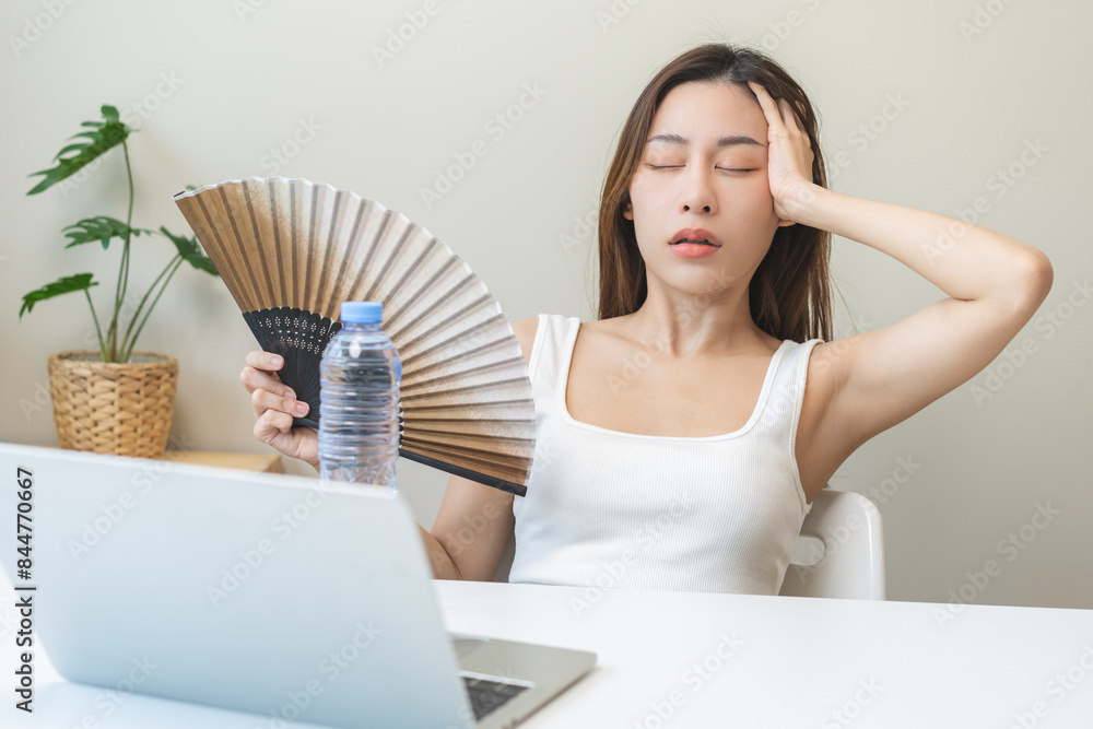 Suffering summer heat wave stroke, hot weather, tired asian young woman ...