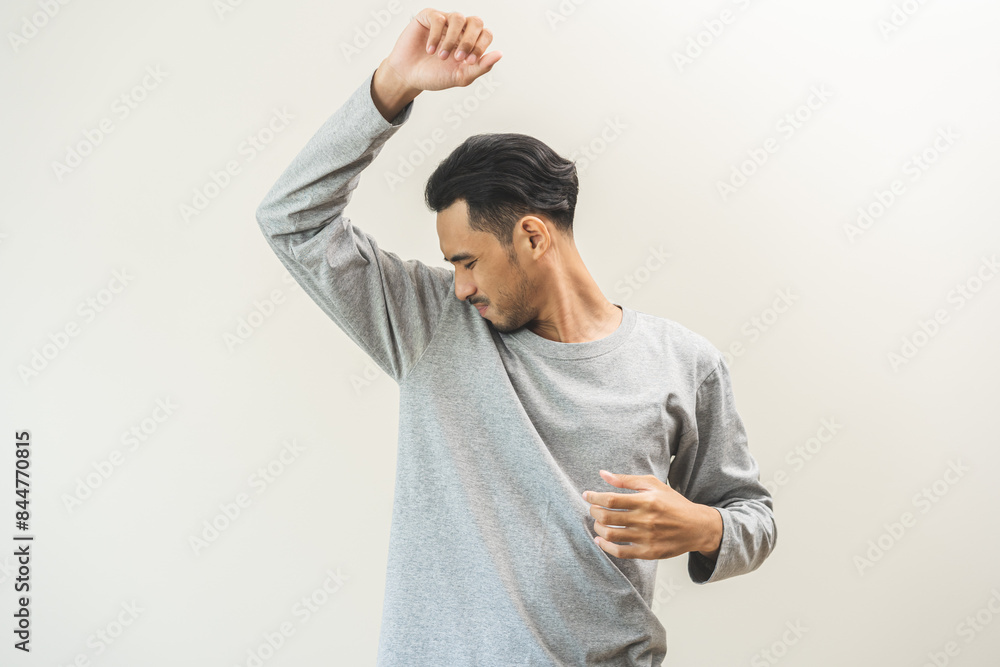 Bad smelling, deodorant asian young man smell stink, breathing nose ...