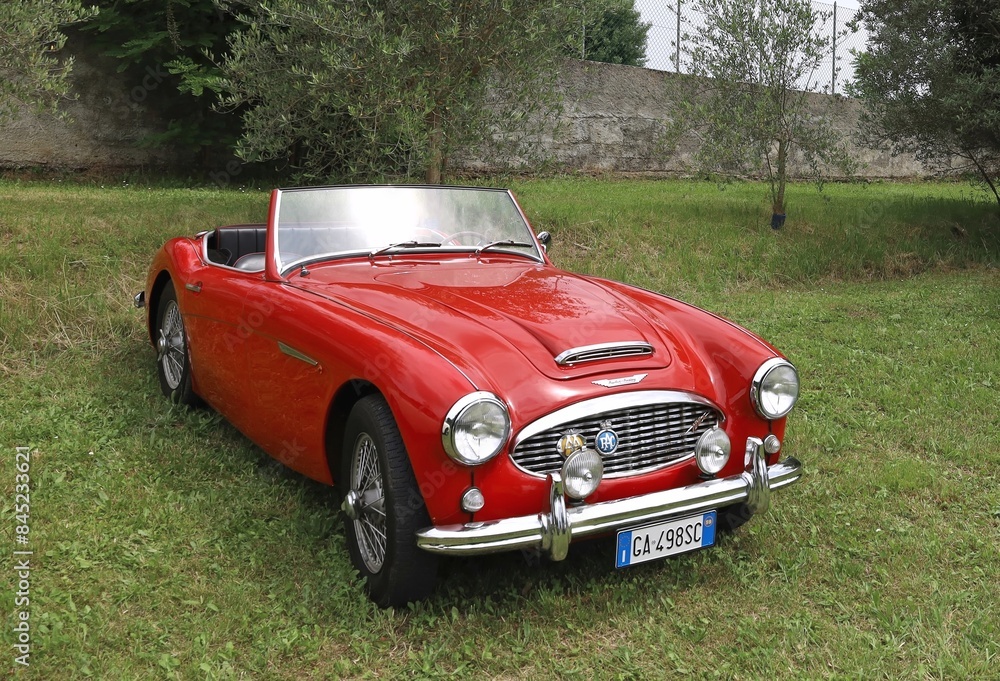 Buttrio, Italy. June 9, 2024. Bright red Austin Haley 3000, british ...