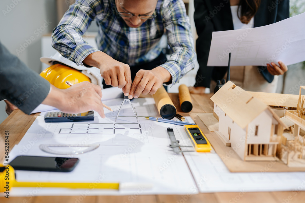 Engineer teams meeting working together wear worker helmets hardhat ...