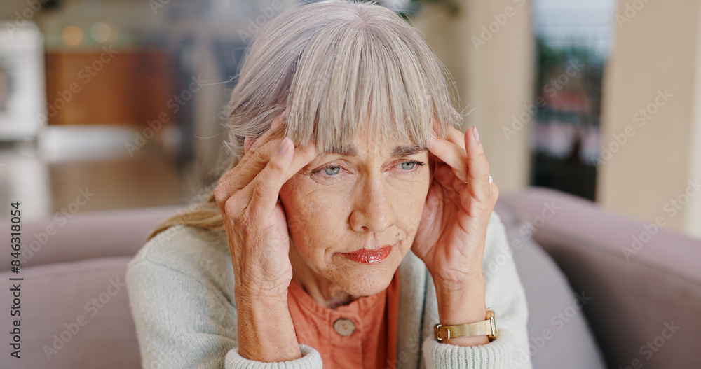 Senior woman, thinking and depressed in lounge, hand and memory of past, retirement and sad in ...
