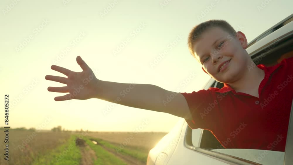 child kid extends hand from car window, kid stuck head out window wind ...