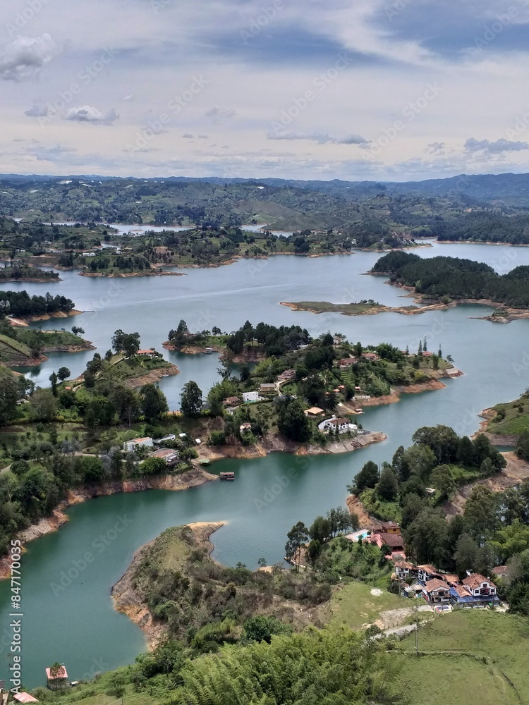 Beautiful viewpoint looking out to bays of water and tropical Islands ...