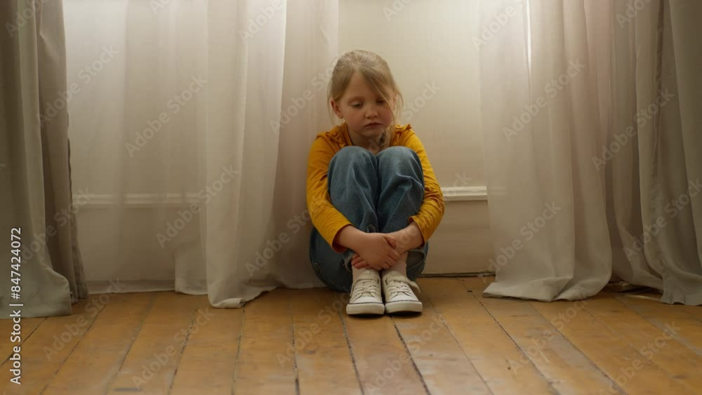 Unhappy little girl child loneliness sad kid daughter hugging knees ...
