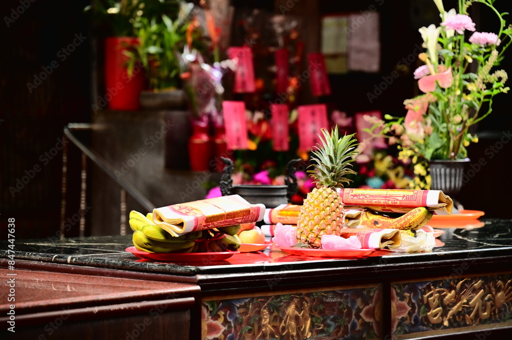 Taiwan - May 25, 2024: The offerings at Qingyuan Temple's (慶元宮) altar ...