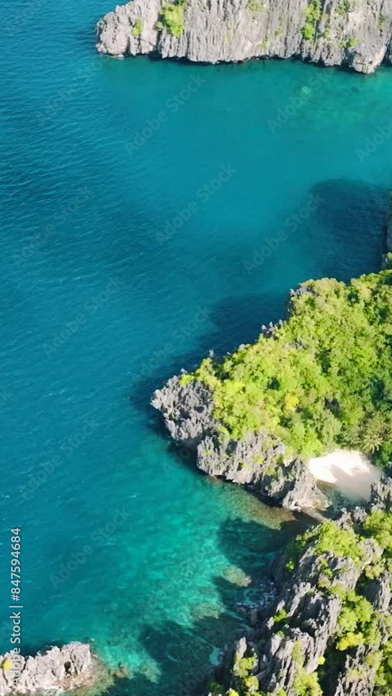Group of boats in Twin Rocks and Lagoons in Miniloc Island. El Nido ...