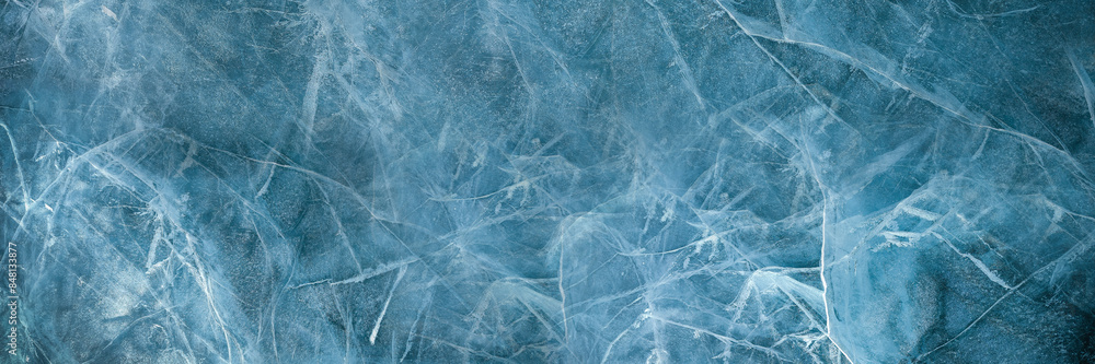 Abstract natural ice texture. Freezy ice surface. Blue backdrop with ...