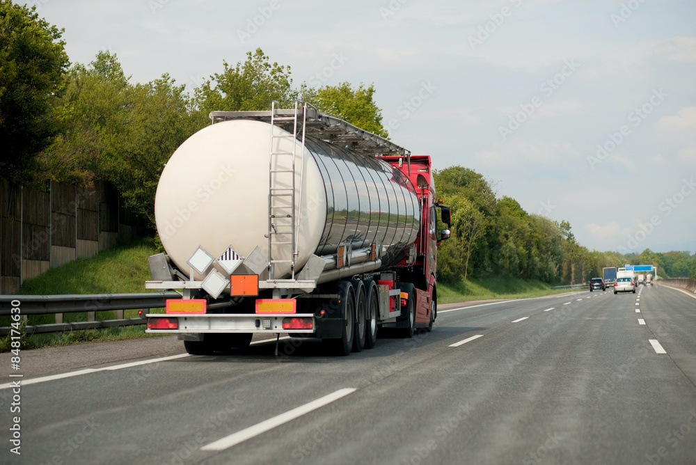 Petrol truck on highway hauling fossil oil refinery products. Fuel ...