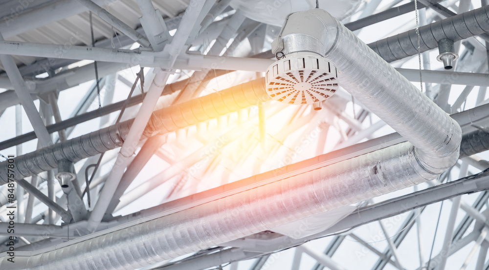 Ventilation system in shopping mall, pipes hvac duct tube hanging from ...