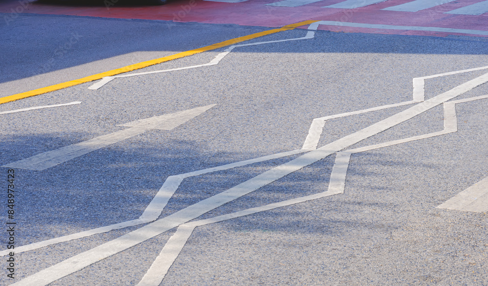 Zigzag traffic white line on city street surface before pedestrian ...